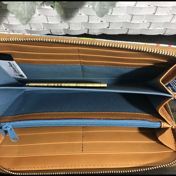 Dooney & Bourke | Bags | Disneys Its A Small World Wallet By Dooney Bou ...